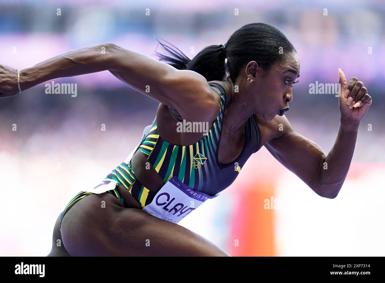 Rushell Clayton, of Jamaica, competes in a women'a 400 meters hurdles ...