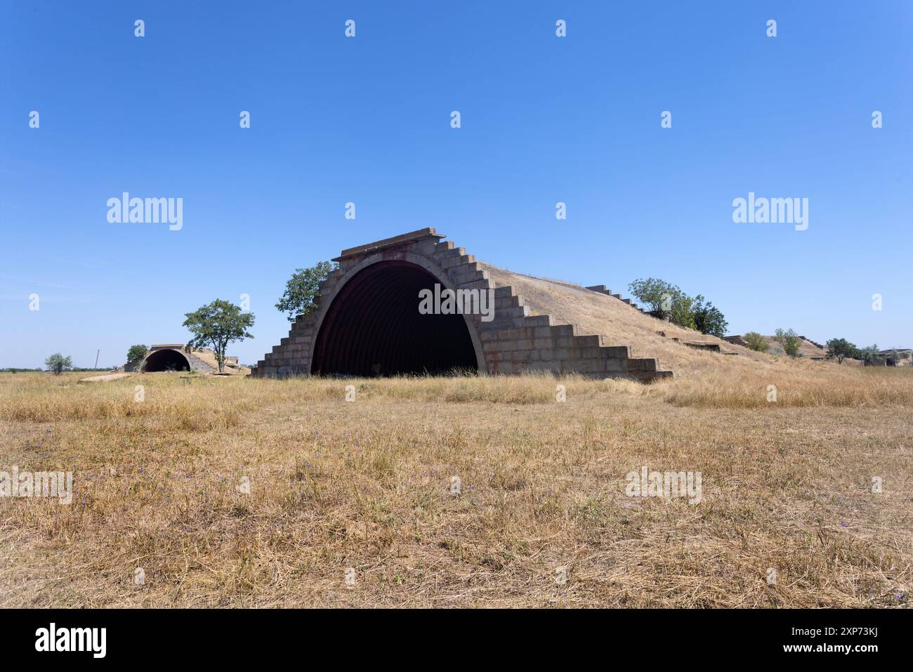 Hangar Empty aircraft hangar. Abandoned bunker. Lost airfield. Entrance ...
