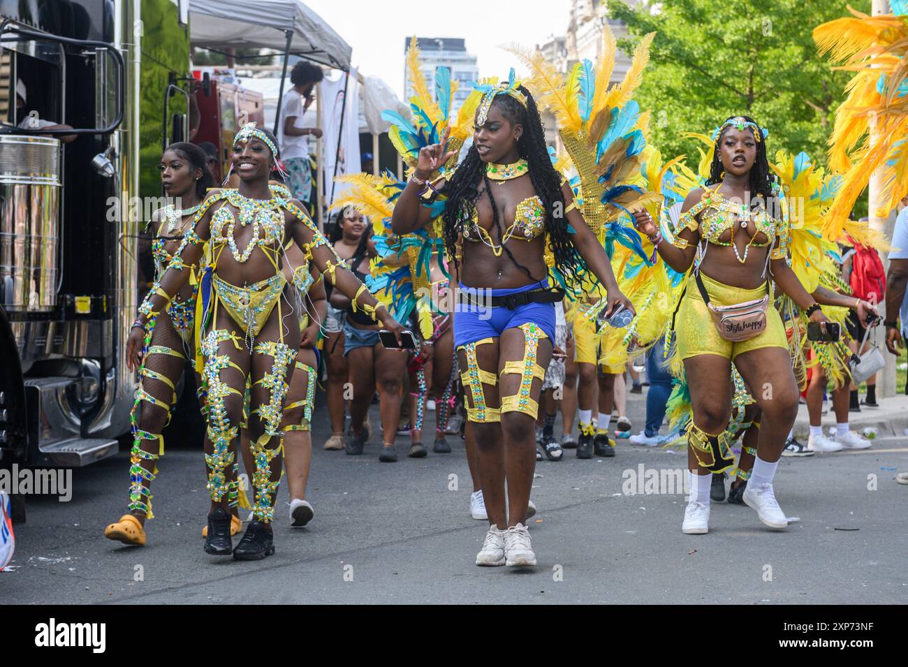 Toronto, ON, Canada - August 3, 2024: parade participants are dancing at the Toronto Caribbean ...