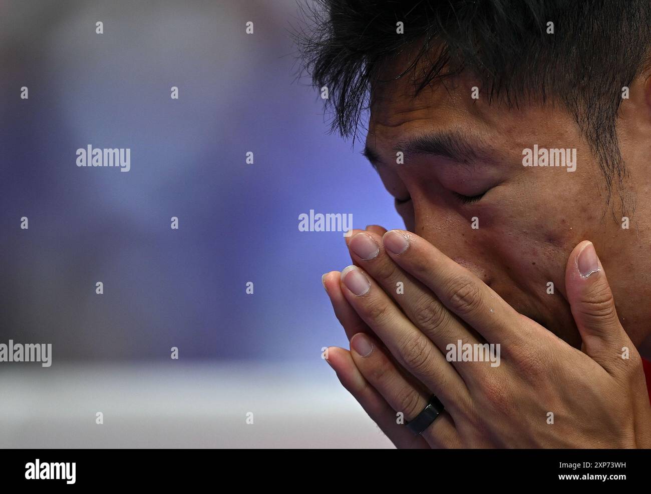 Paris, France. 4th Aug, 2024. Shi Yuhao of China reacts after the men's long jump qualification ...