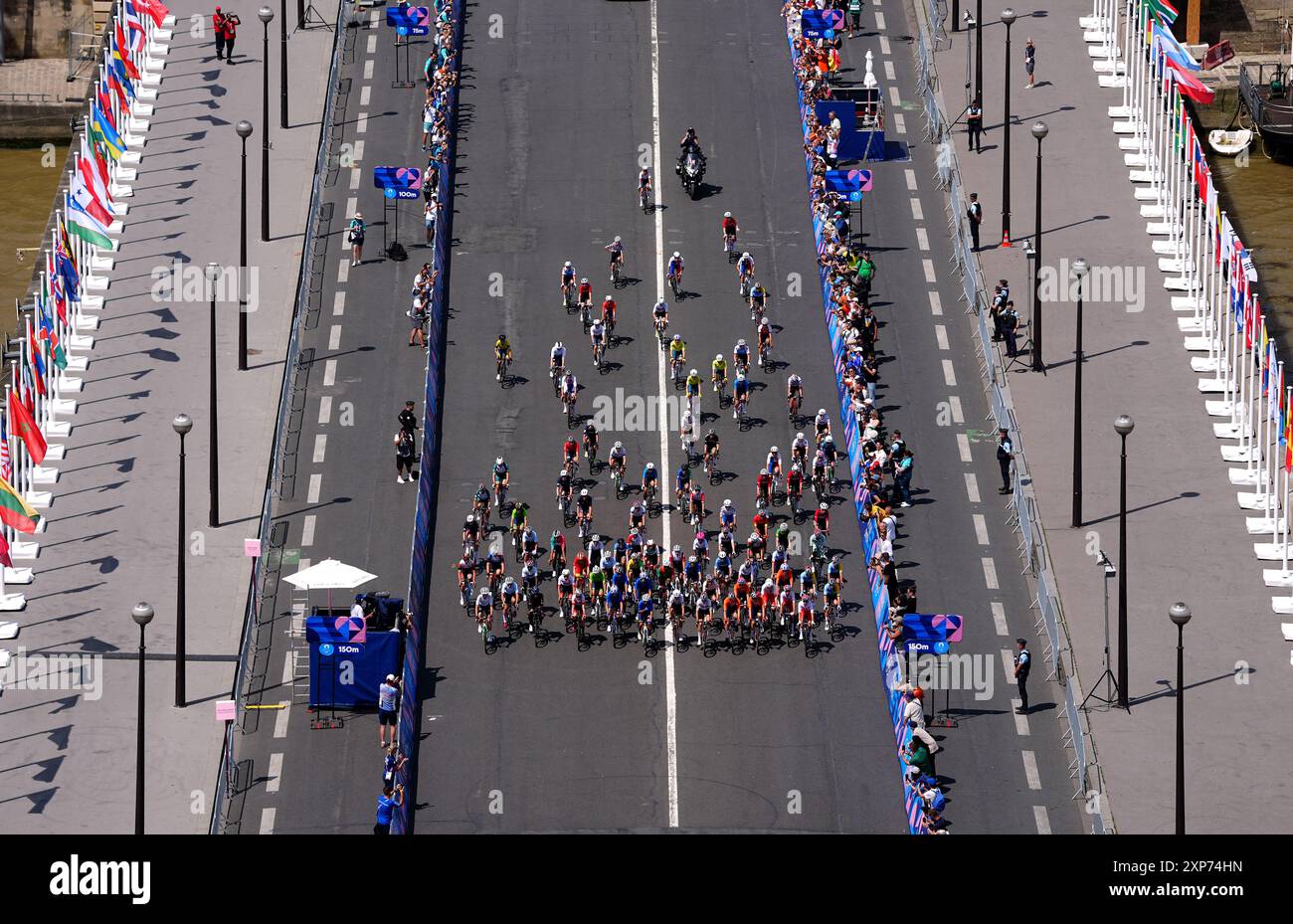 Riders at the start of the Women's Cycling Road Race on the ninth day ...