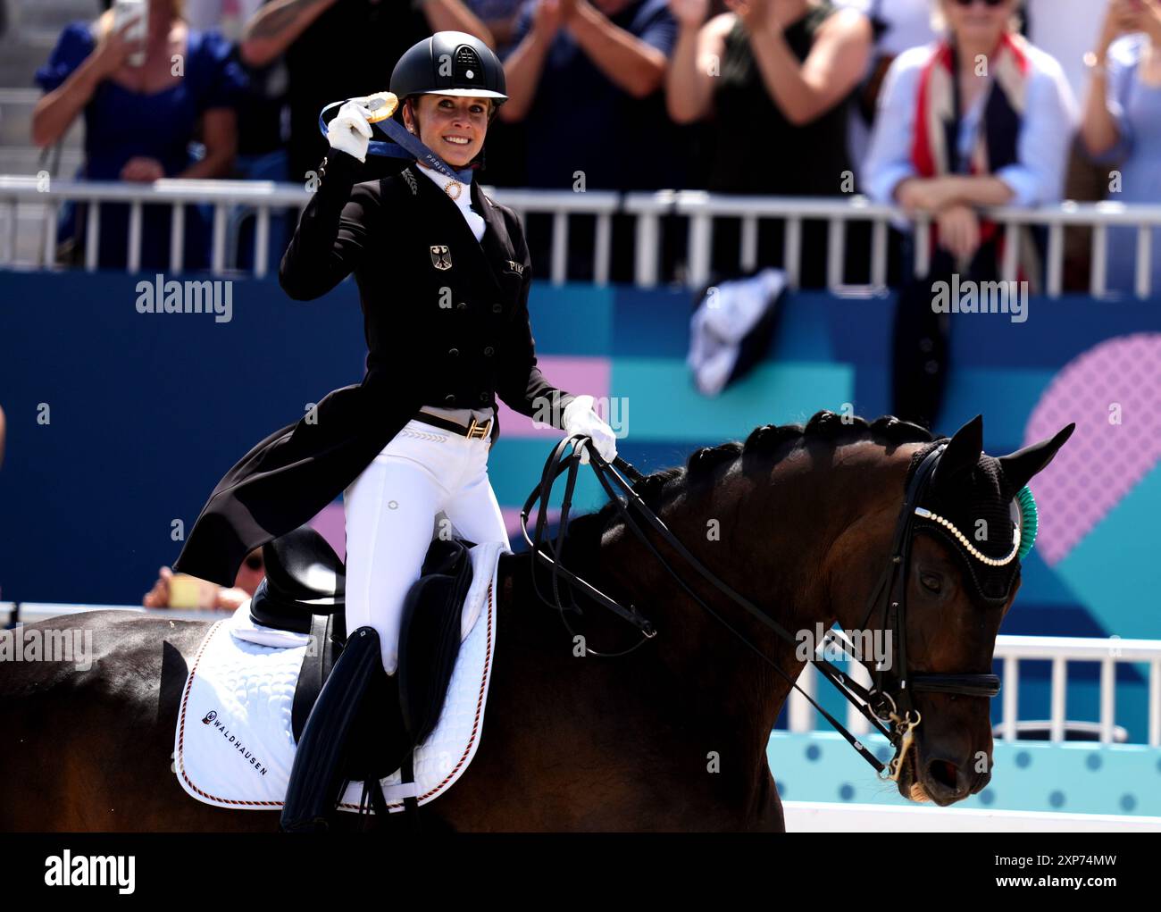 Gold medalist Jessica Von Bredow-Werndl of Germany following the ...