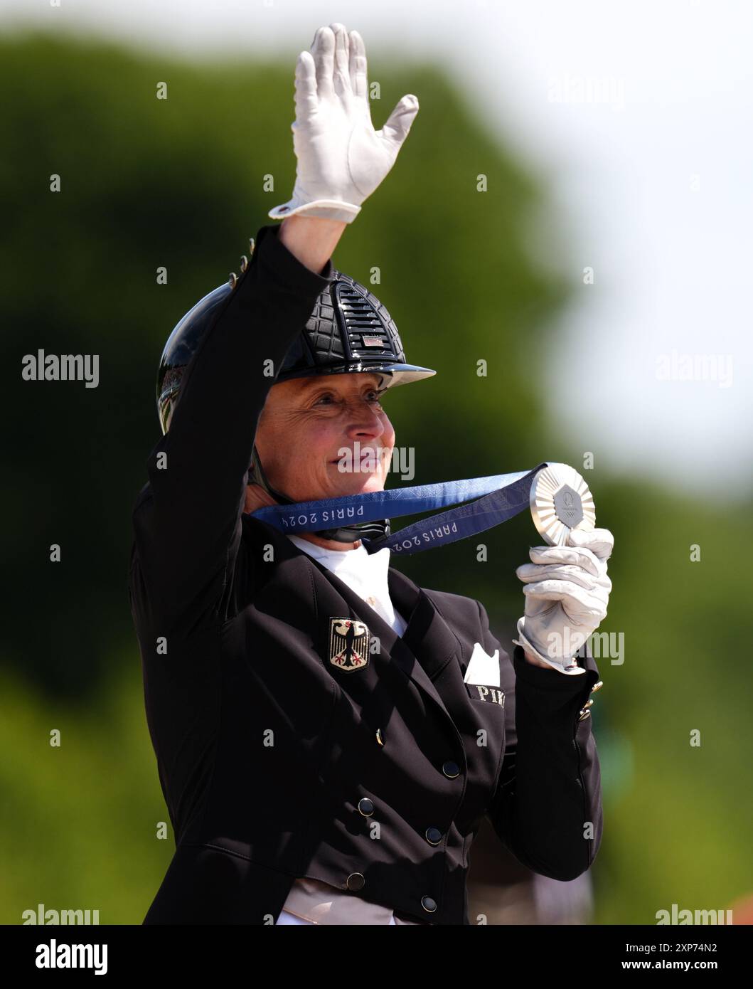 Silver medalist Isabell Werth of Germany following the Dressage ...