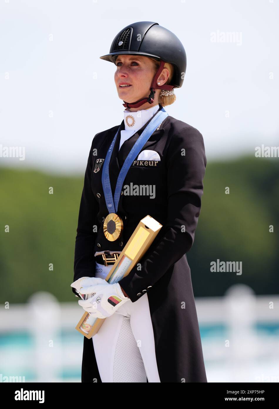 Gold medalist Jessica Von Bredow-Werndl of Germany following the ...