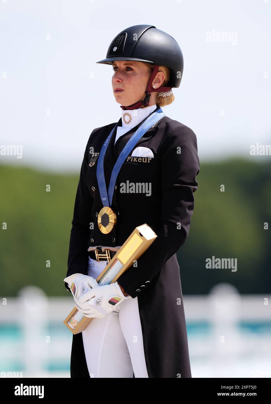 Gold medalist Jessica Von Bredow-Werndl of Germany following the ...