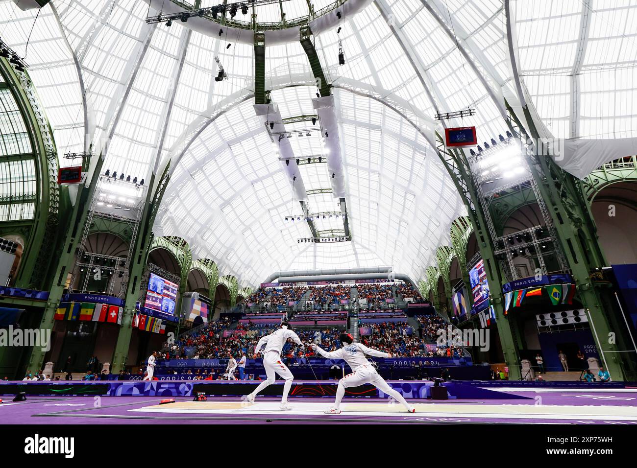 Jie Xu of China and Blake Broszus of Canada competes during Men's Foil ...