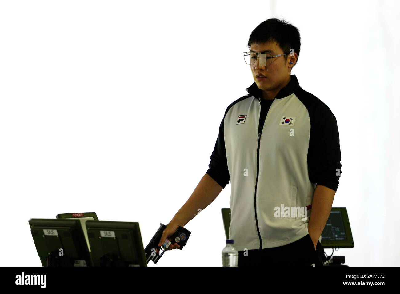 South Korea's Cho Yeong-jae competes in the 25m rapid fire pistol men's ...