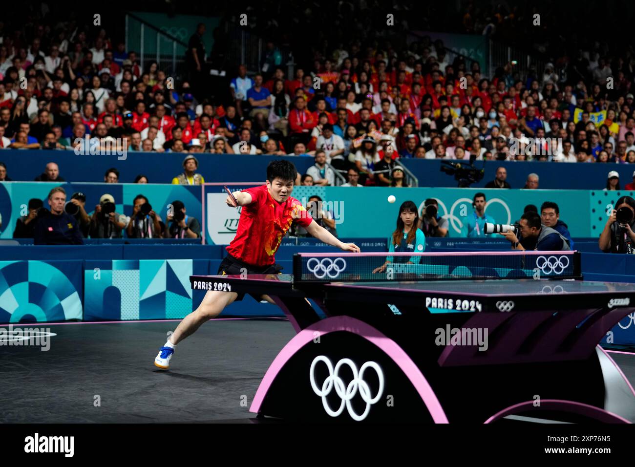 China's Fan Zhendong plays against Sweden's Truls Moregard during the ...