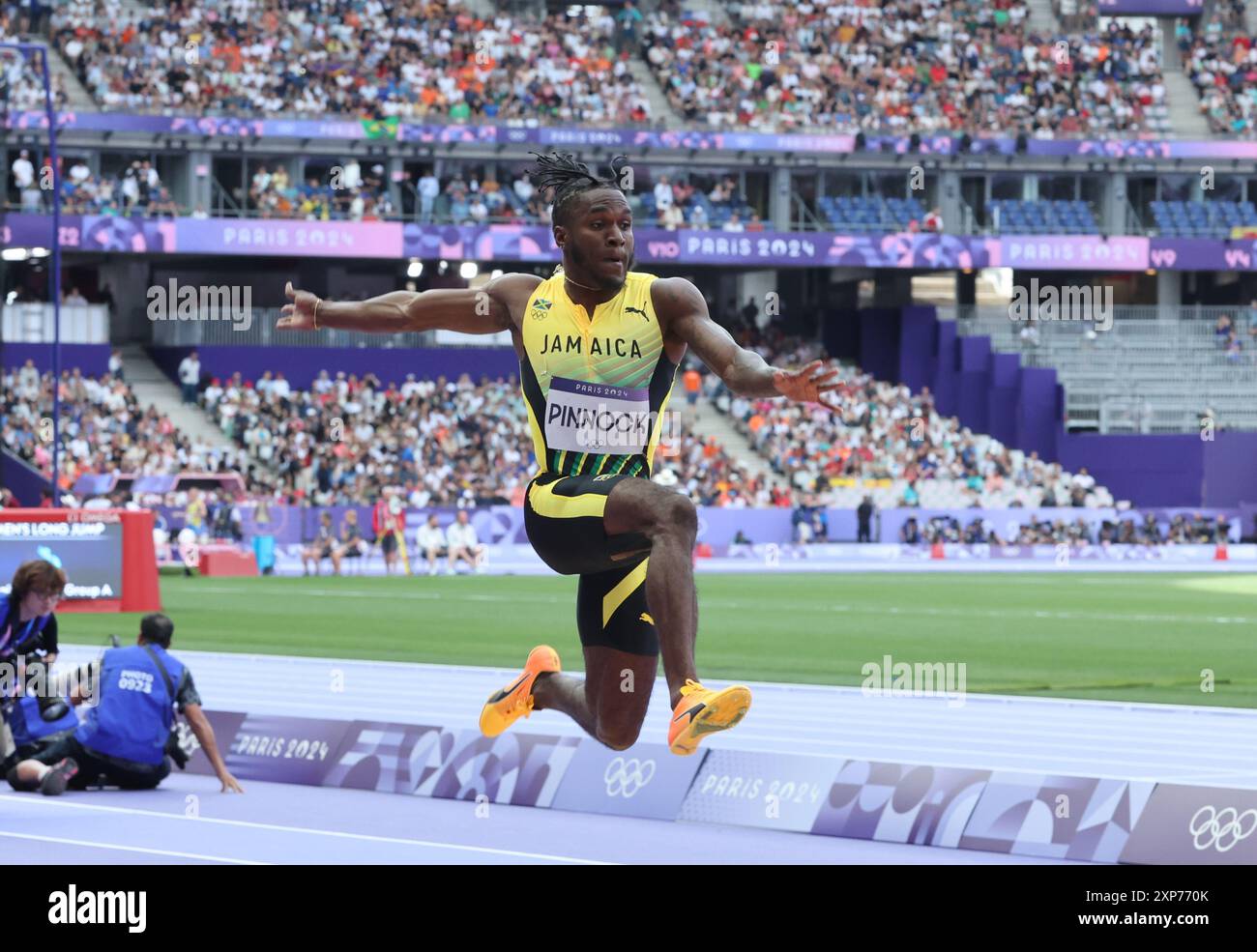Paris, France. 04th Aug, 2024. Wayne Pinnock of Jamaica jumps during ...