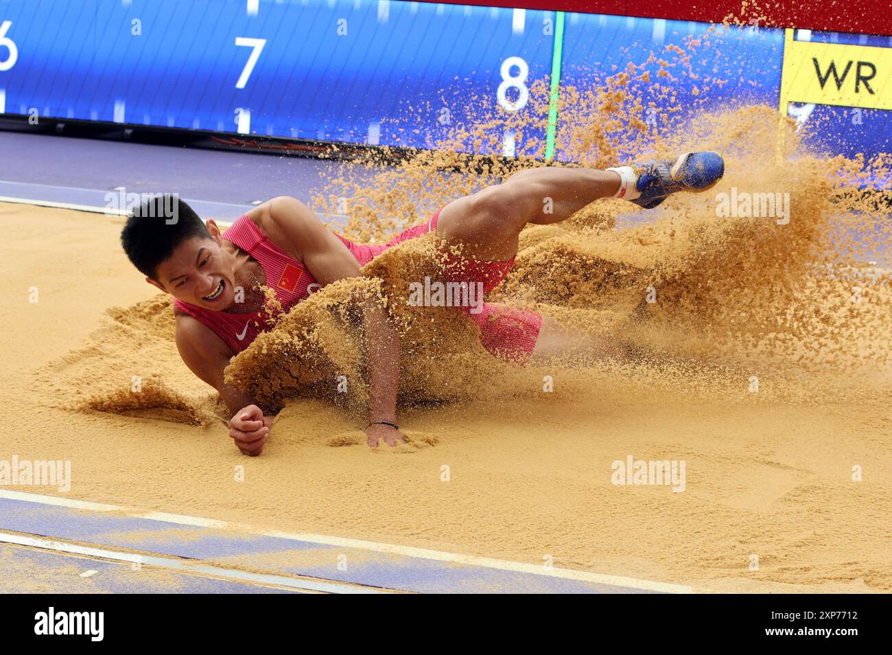 Paris, France. 04th Aug, 2024. Mingkun Zhang of China jumps during the Men's Long Jump ...