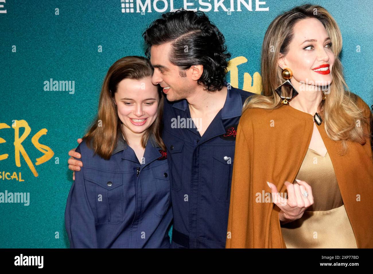 Vivienne Jolie-Pitt, from left, Justin Levine and Angelina Jolie attend ...