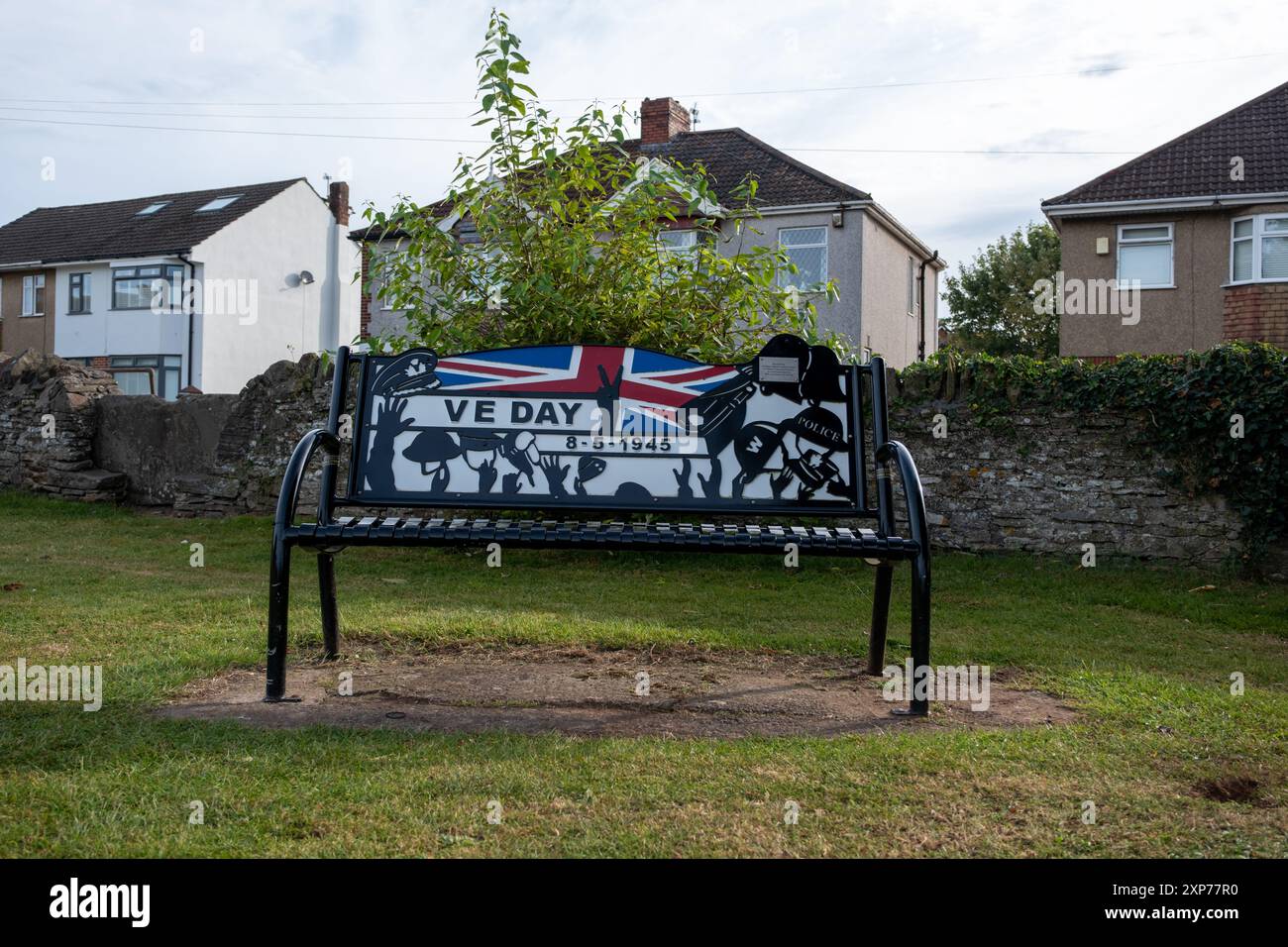Metal bench commemorating VE Day, Hanham, Bristol, UK Stock Photo - Alamy