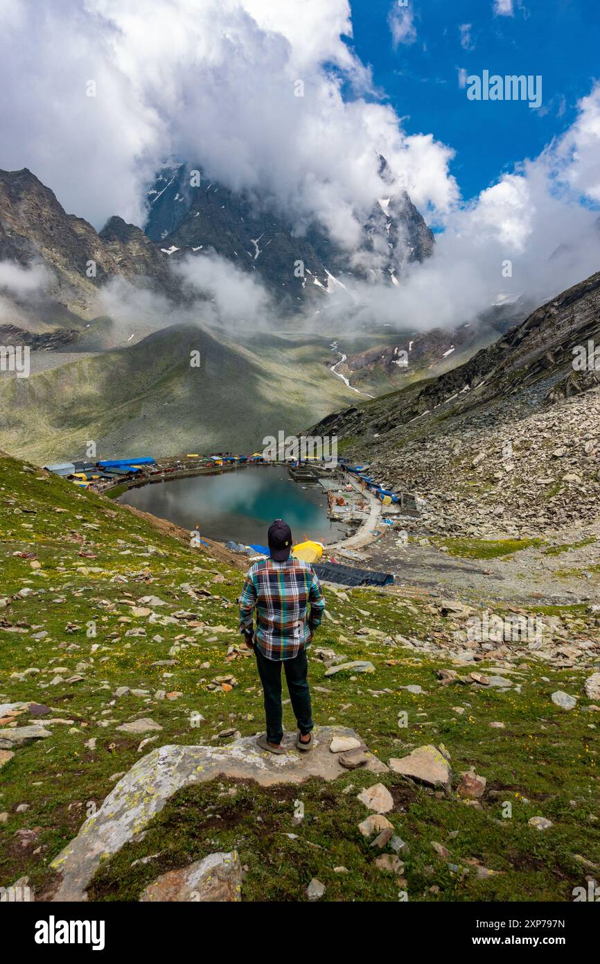 July25th2024, Himachal Pradesh, India. Devotee embraces the beauty of ...