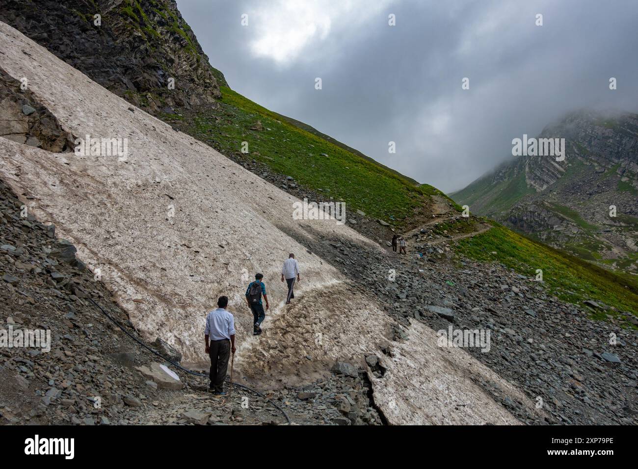 July25th2024, Himachal Pradesh, India. People crossing a glacier ...