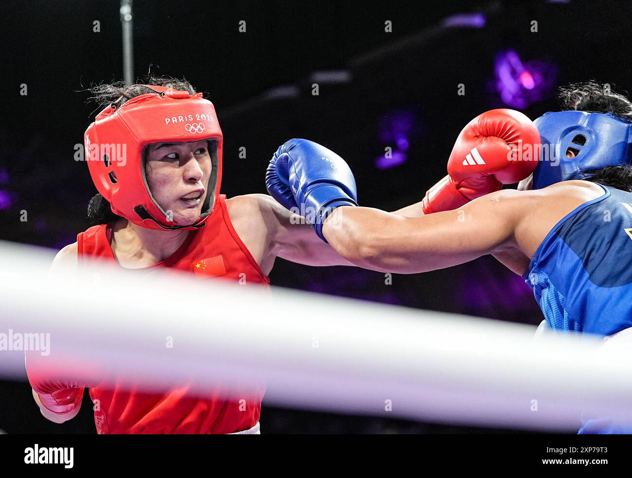 Paris, France. 4th Aug, 2024. Li Qian (L) of China competes with ...