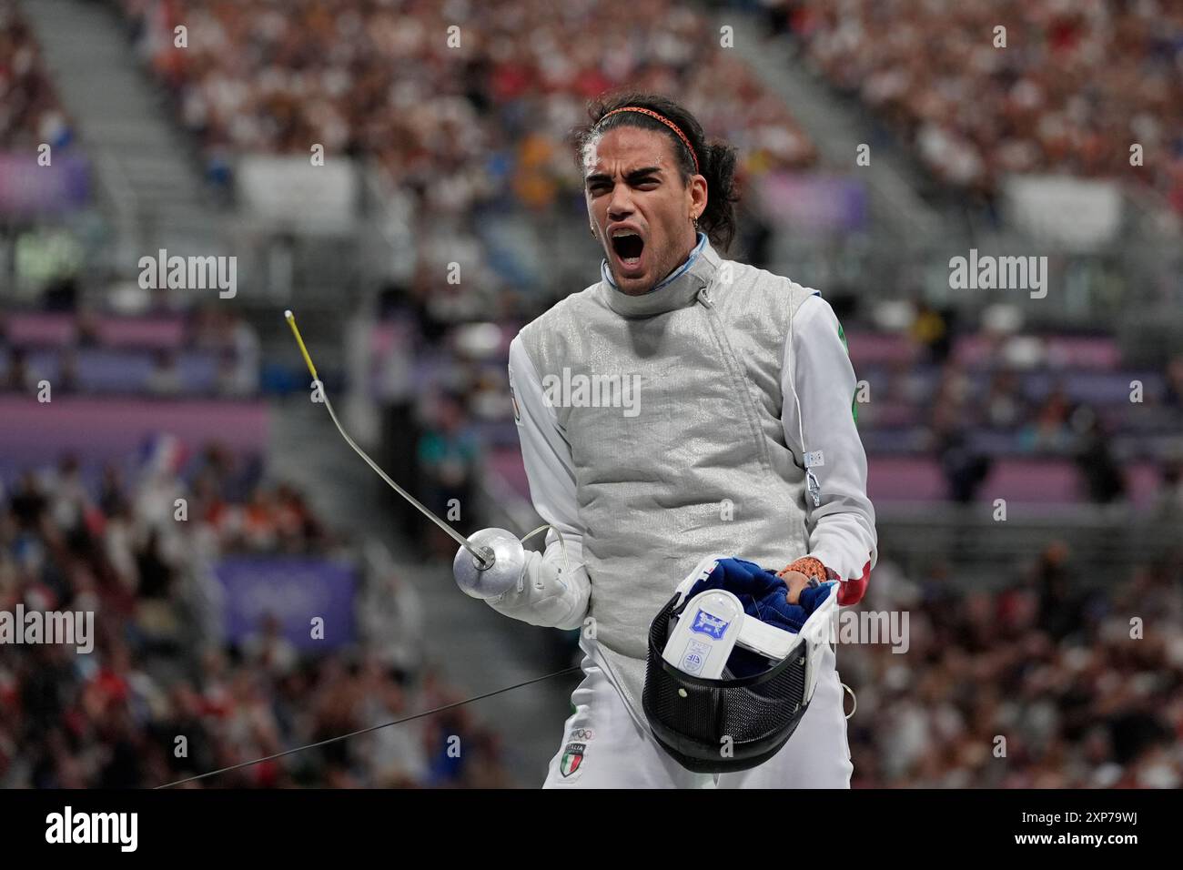 Italy's Tommaso Marini reacts as he competes with United State's Nick ...