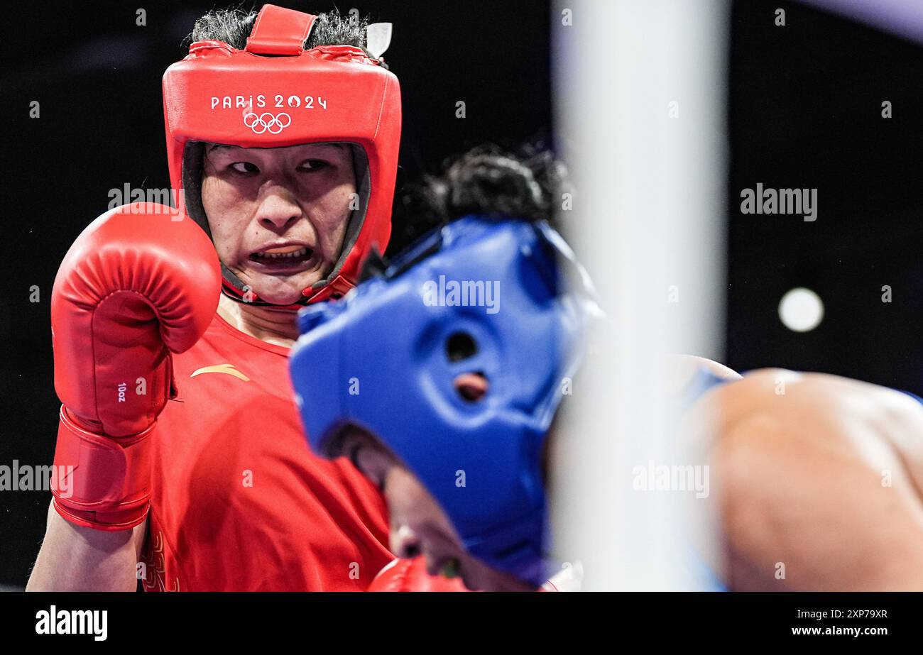 Paris, France. 4th Aug, 2024. Li Qian (L) of China competes with ...