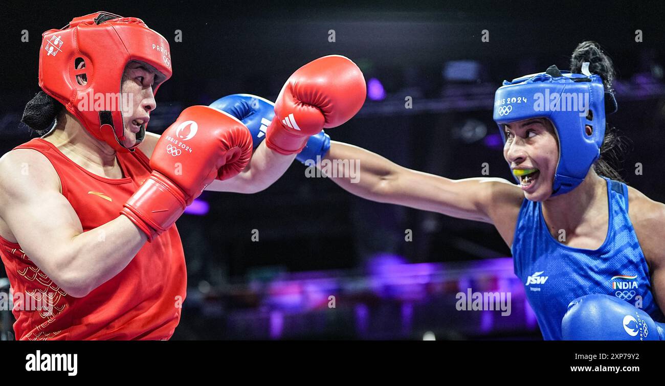 Paris, France. 4th Aug, 2024. Li Qian (L) of China competes with ...