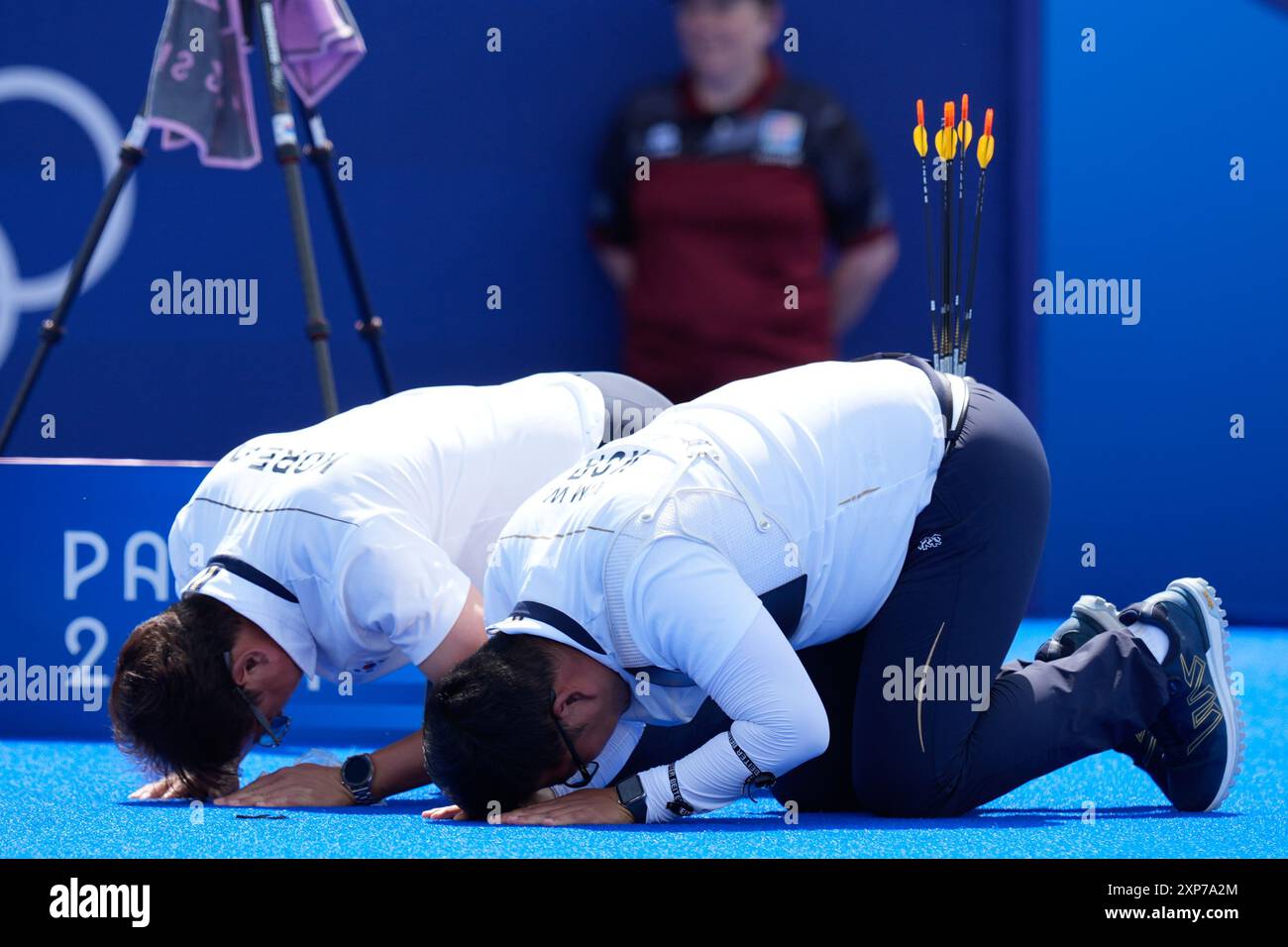 South Korea's Kim Woo-jin, right, and his coach Park Seong-su bow ...