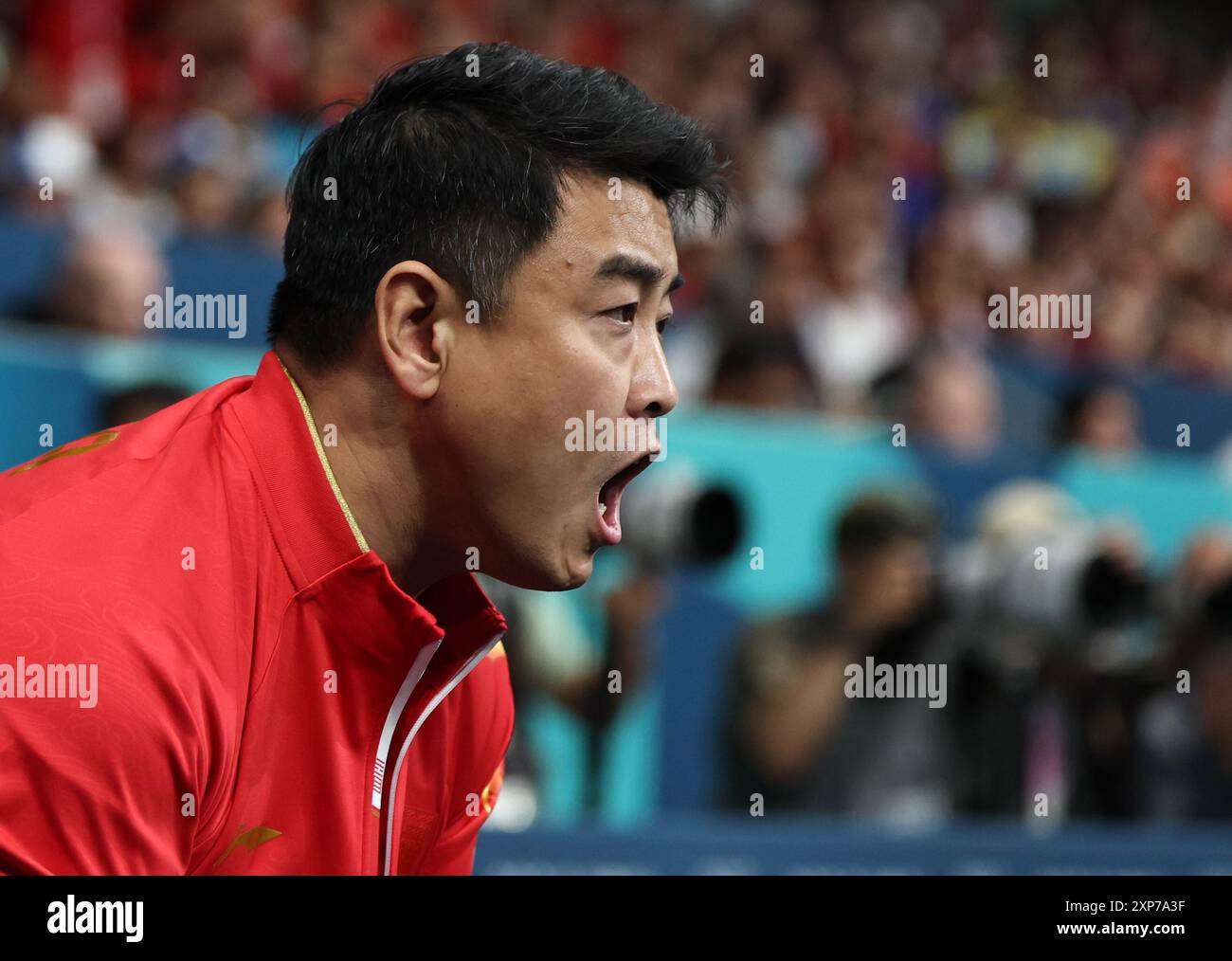 Paris, France. 4th Aug, 2024. Coach Wang Hao of China reacts during the men's singles gold medal ...