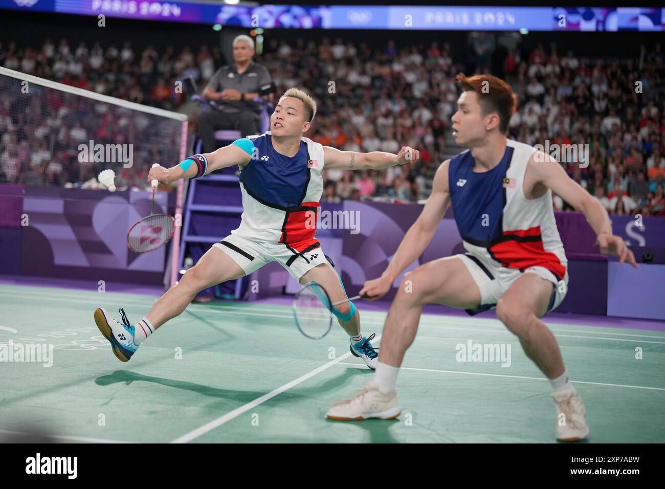 Malaysia's Aaron Chia, left, and Soh Wooi Yik play against Denmark's Kim Astrup and Anders ...