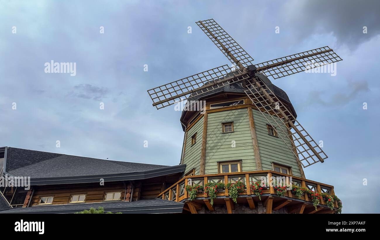 Riga, Latvia - 14 07 2024: A large windmill is positioned on the ...