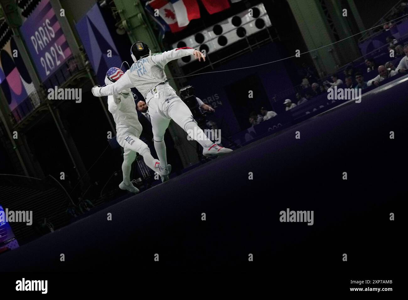 Italy's Filippo Macchi competes with United State's Nick Itkin in the ...