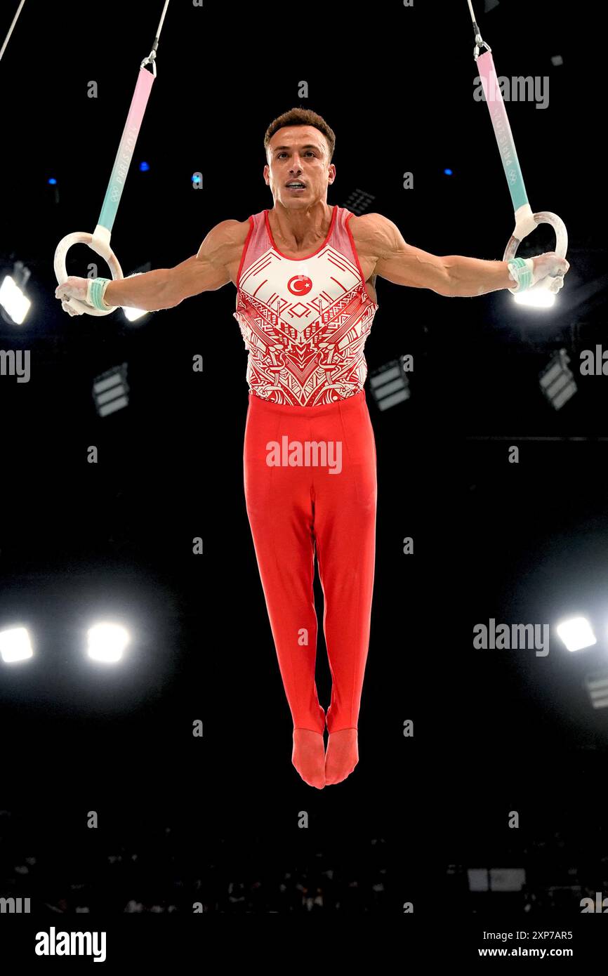 Adem Asil, of Turkey, competes during the men's artistic gymnastics ...
