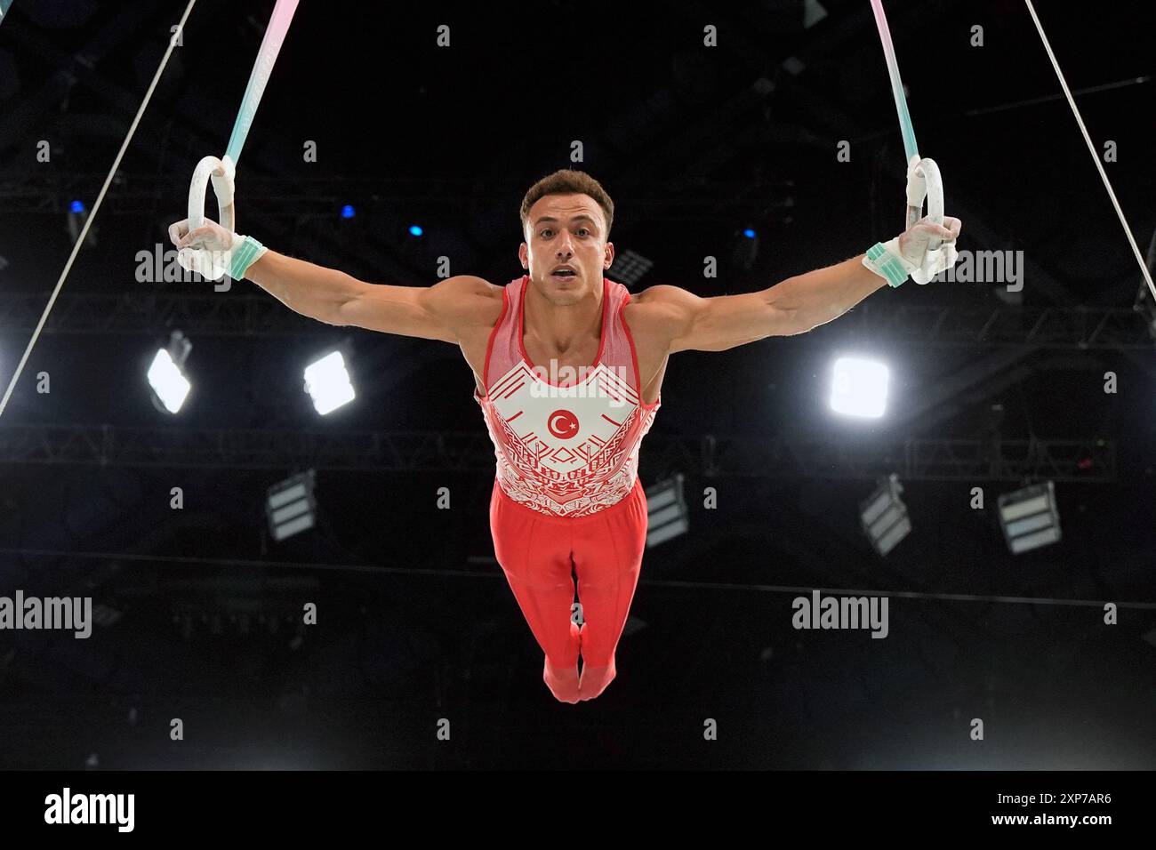 Adem Asil, of Turkey, competes during the men's artistic gymnastics ...