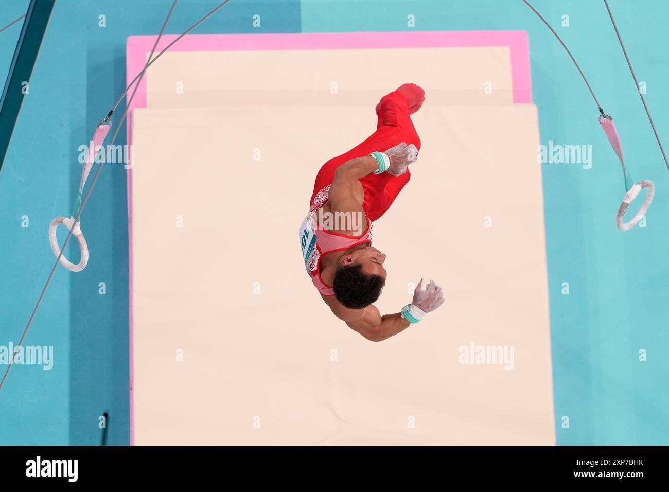 Adem Asil, of Turkey, performs on the rings during the men's artistic ...