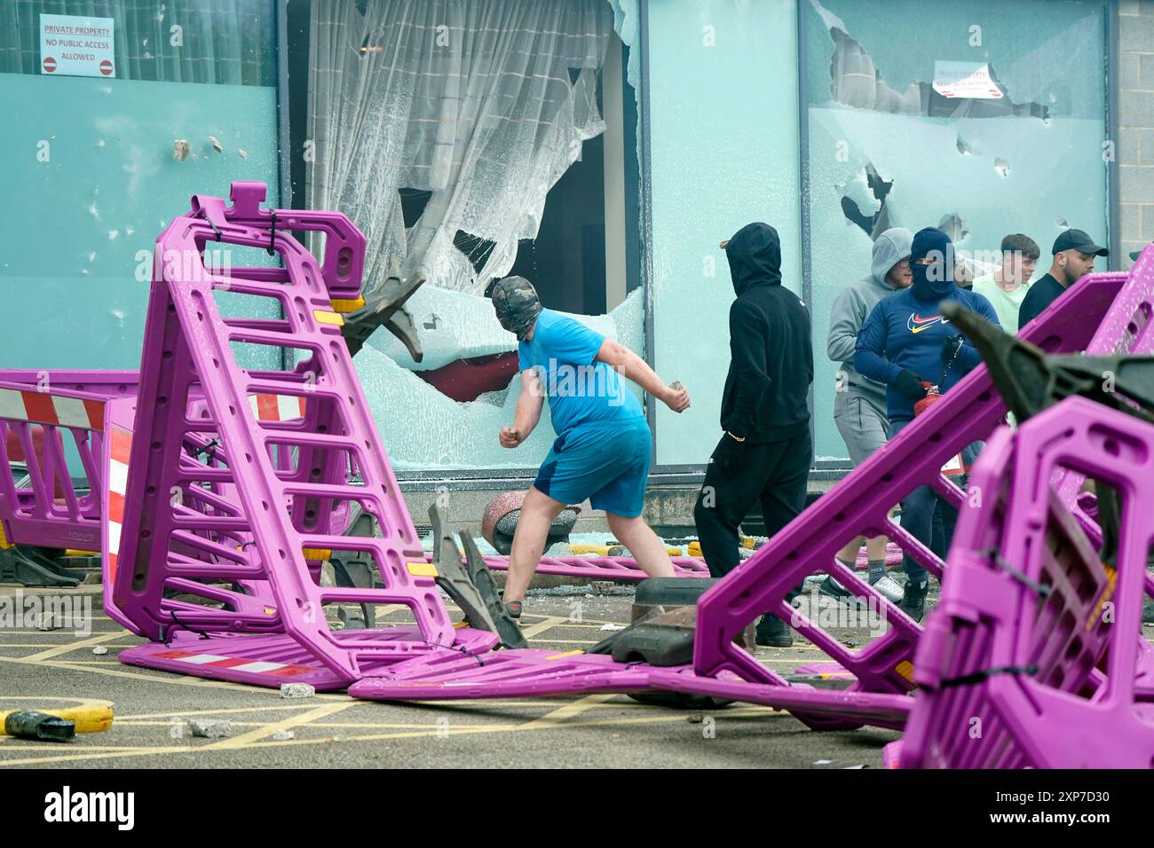 Windows are smashed as trouble flares during an anti-immigration ...