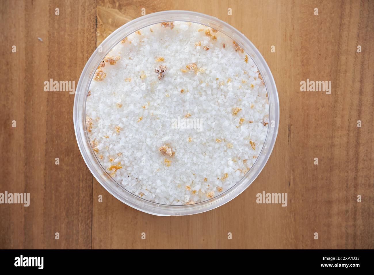 A pack of natural sea salt mixed with dry garlic, produced by local ...