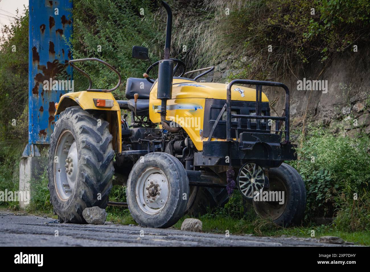 July25th2024, Himachal Pradesh, India. Yellow tractor broken down on ...