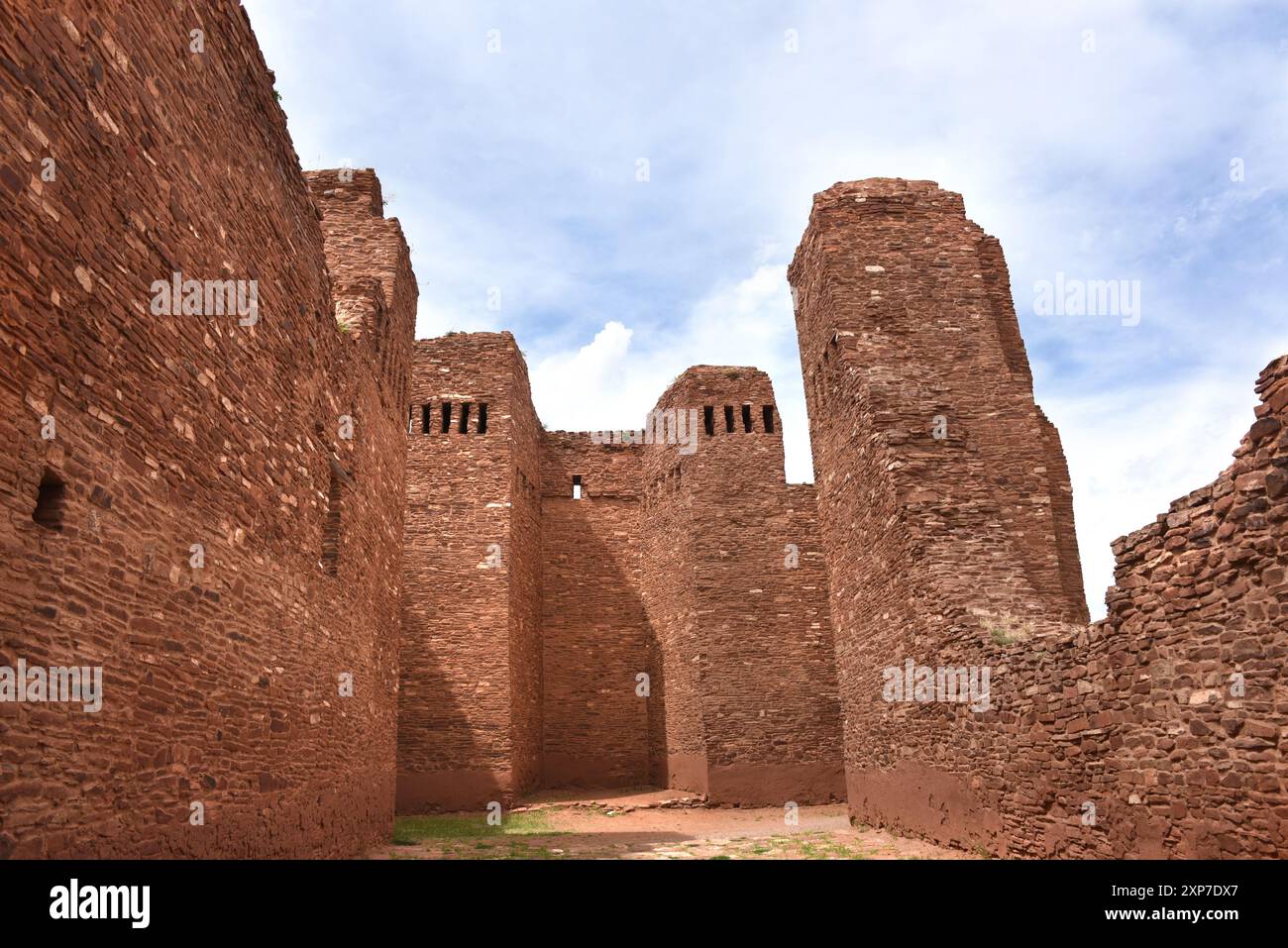 Interior, high walls, constructed of red sandstone, form interior of ...