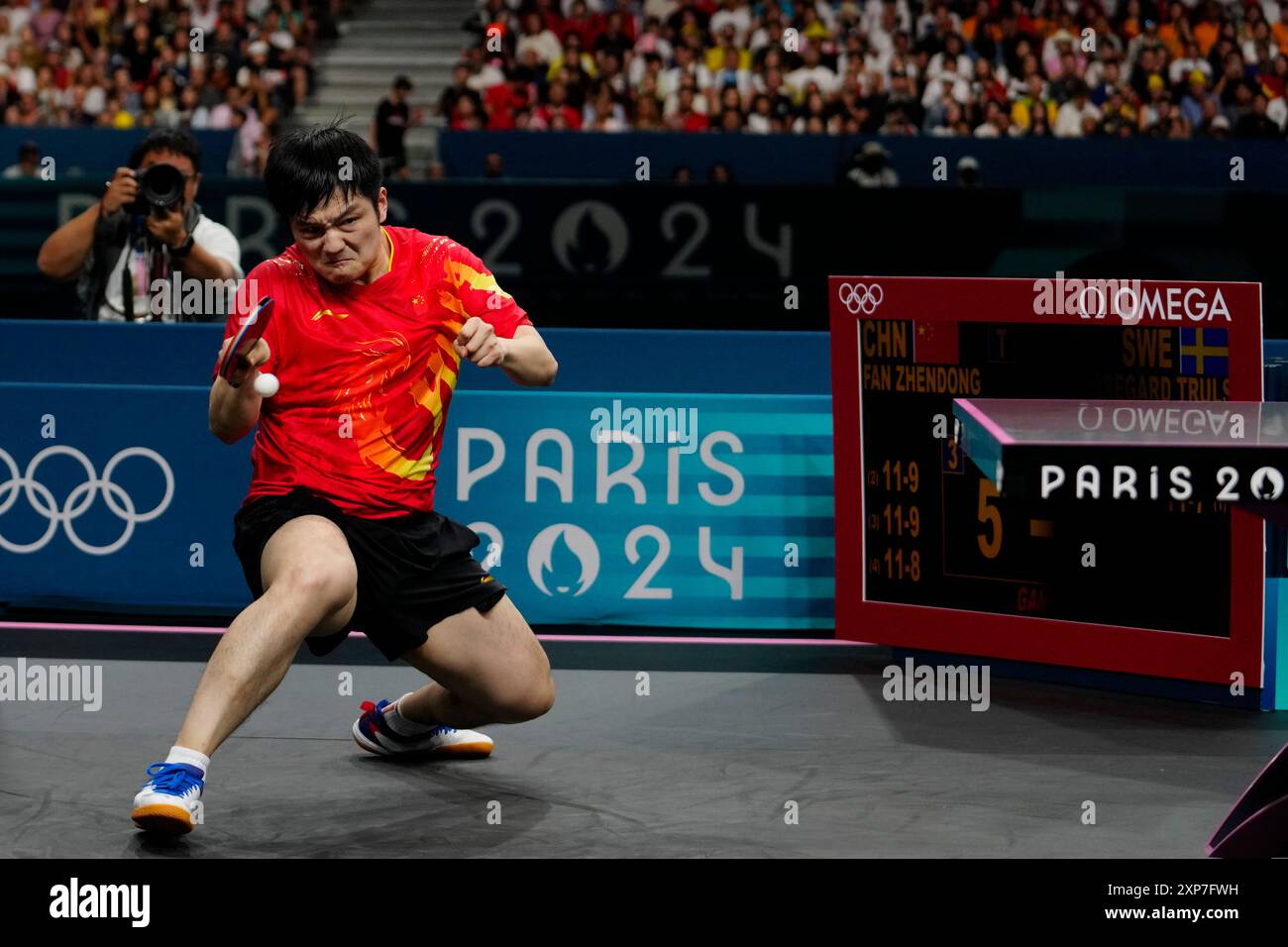 China's Fan Zhendong plays against Sweden's Truls Moregard during the ...