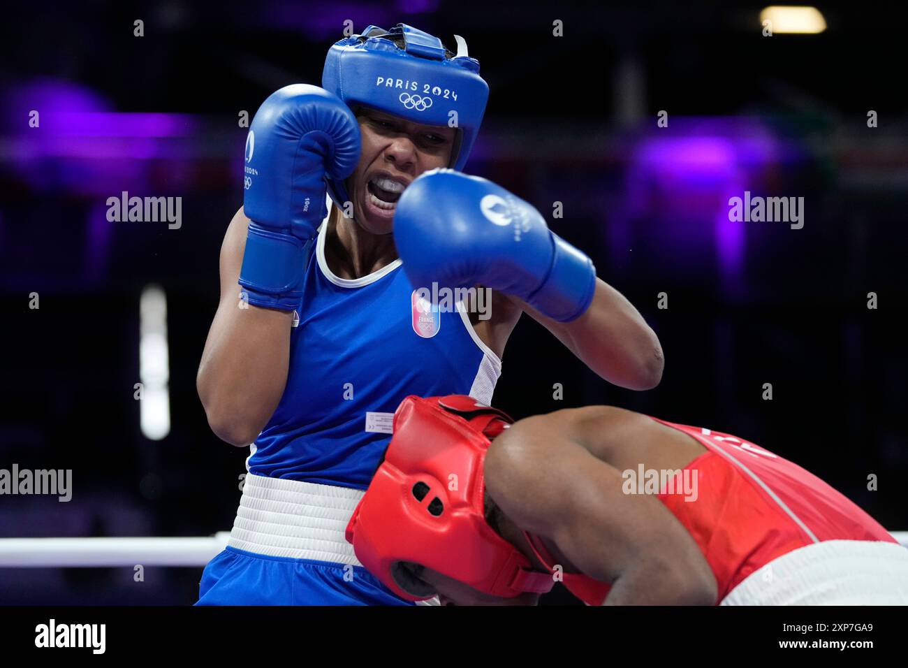 France's Davina Michel, left, fights Refugee Olympic Team's Cindy ...