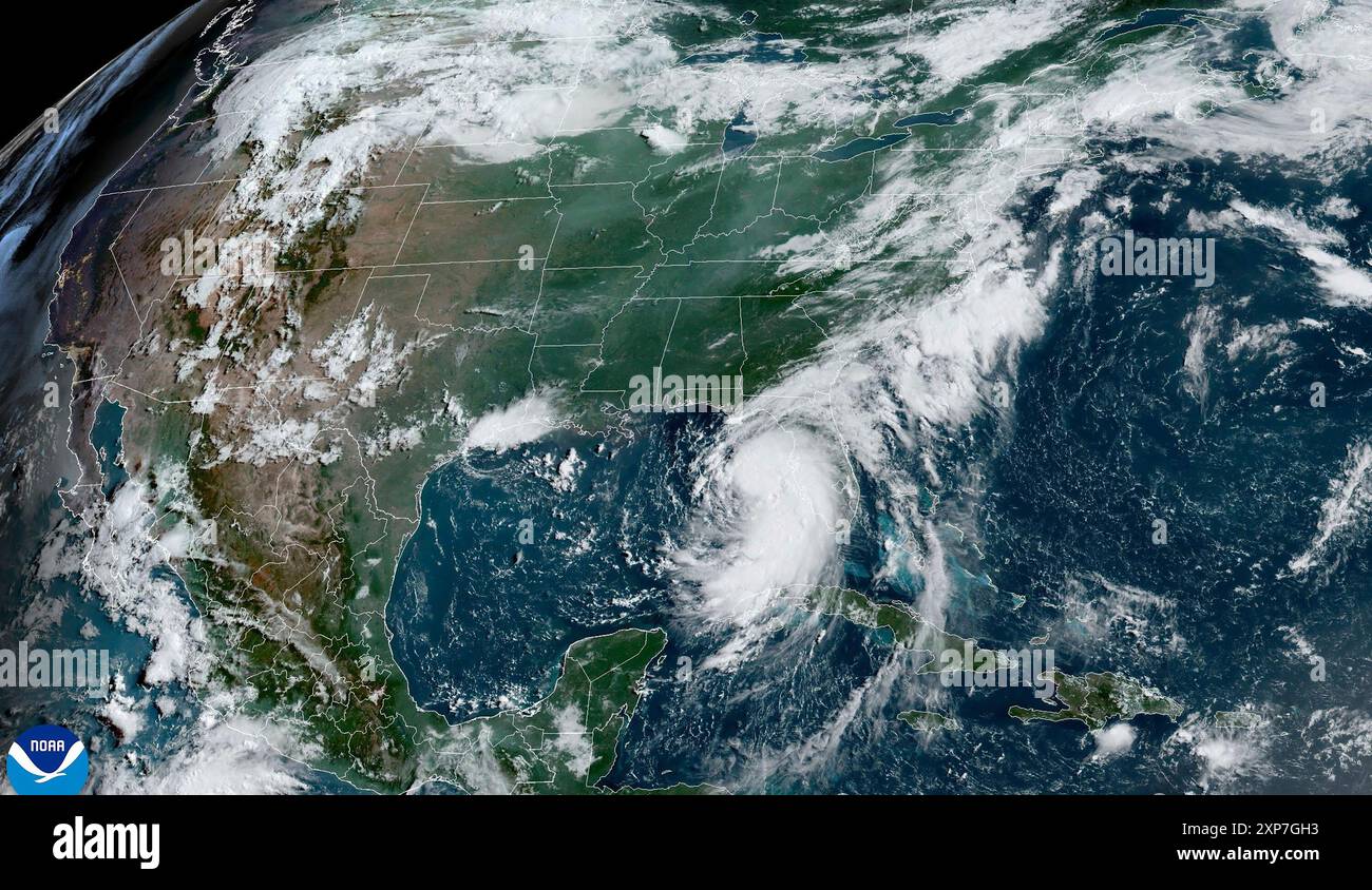 This satellite image provided by NOAA shows Tropical Storm Debby as it ...