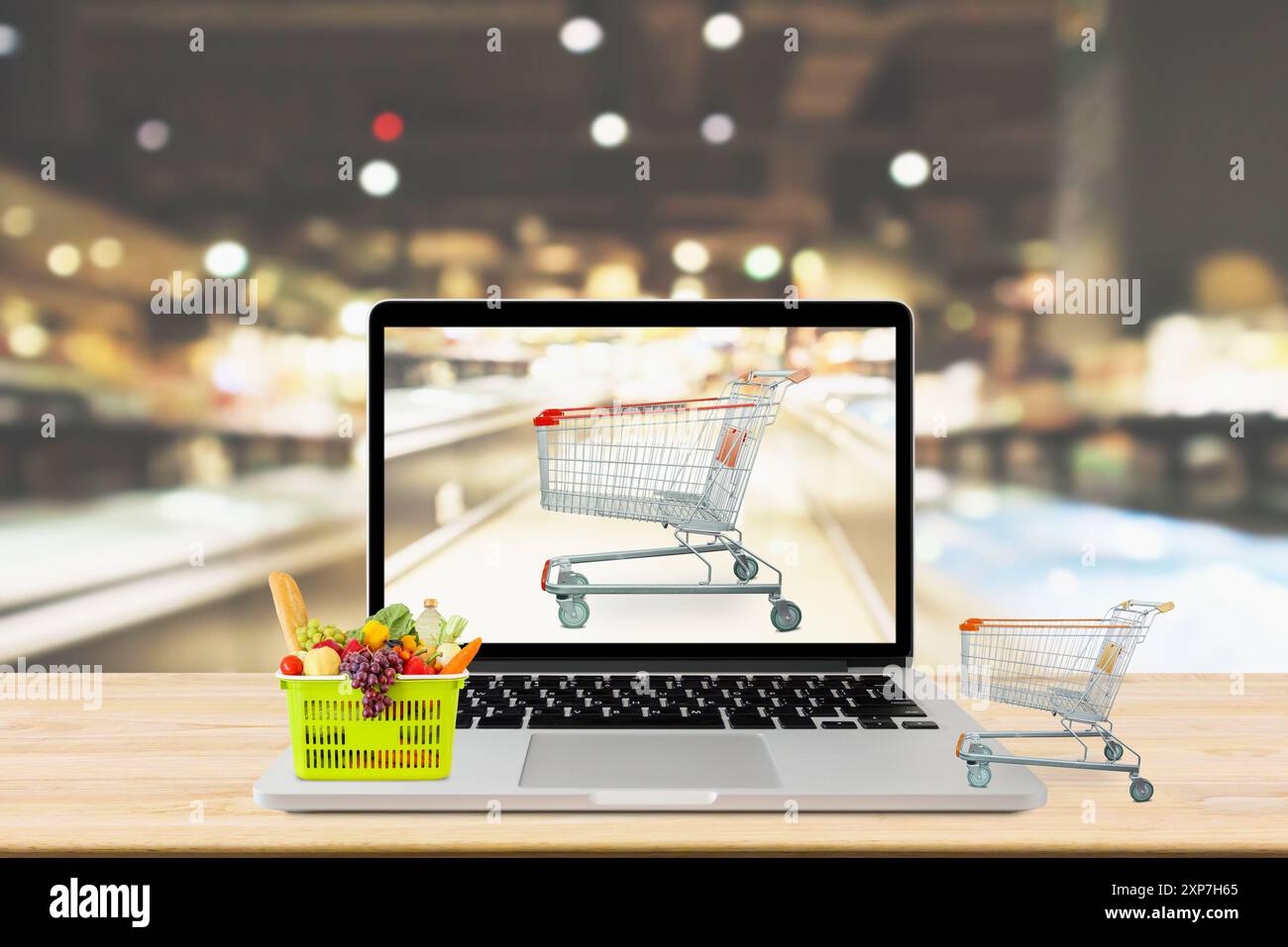 supermarket aisle blurred background with laptop computer and shopping ...