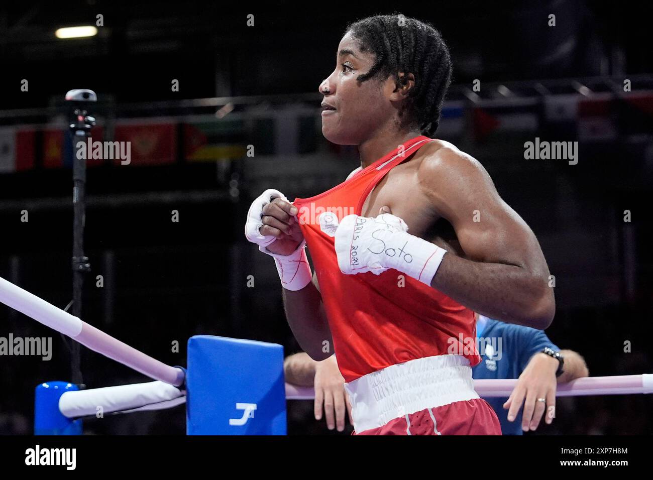 Refugee Olympic Team's Cindy Ngamba celebrates after defeating France's ...