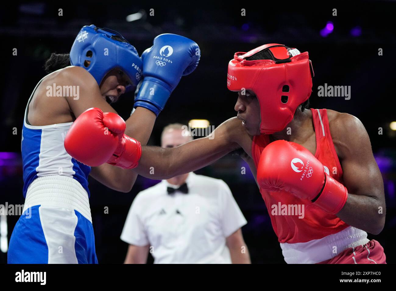 Refugee Olympic Team's Cindy Ngamba, right, fights France's Davina ...