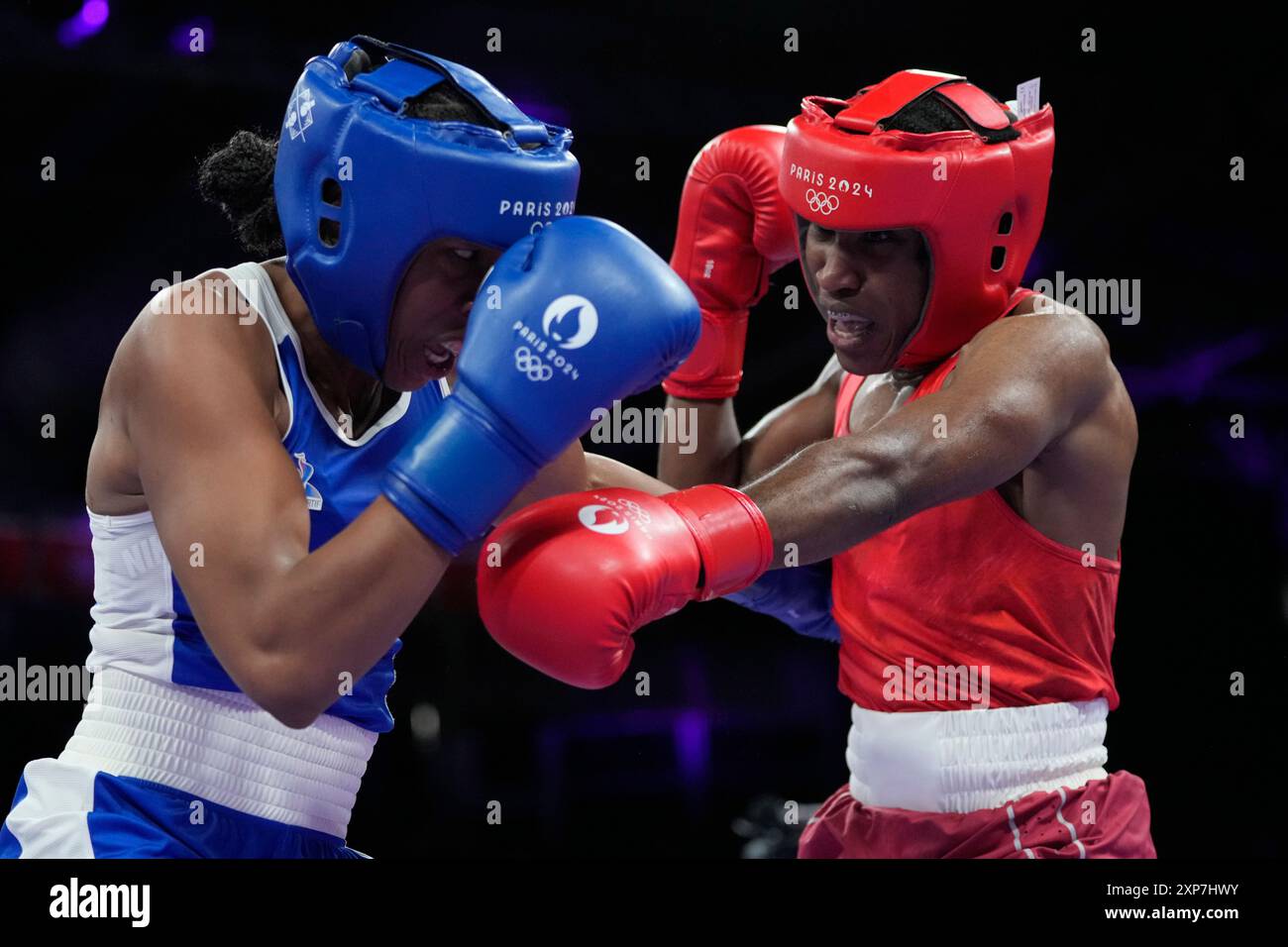 Refugee Olympic Team's Cindy Ngamba, right, fights France's Davina ...