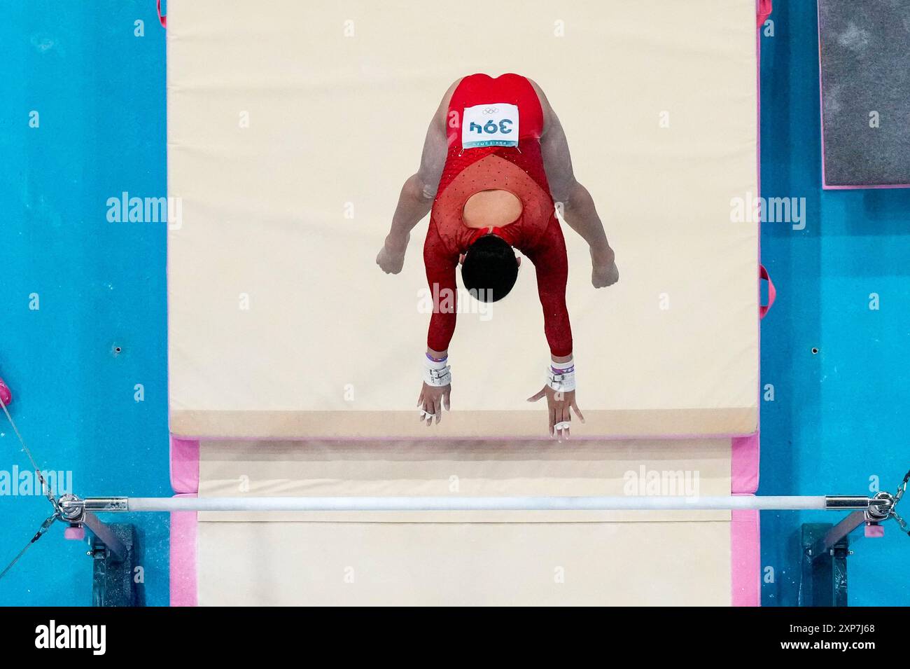 Suni Lee, of the United States, performs on the uneven bars during the ...