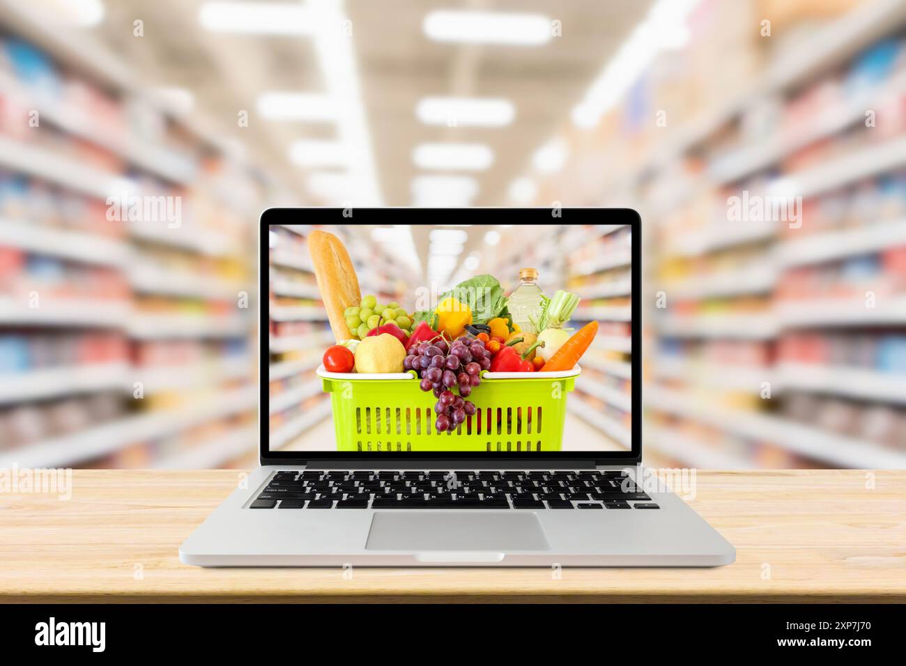 supermarket aisle blurred background with laptop computer and shopping ...