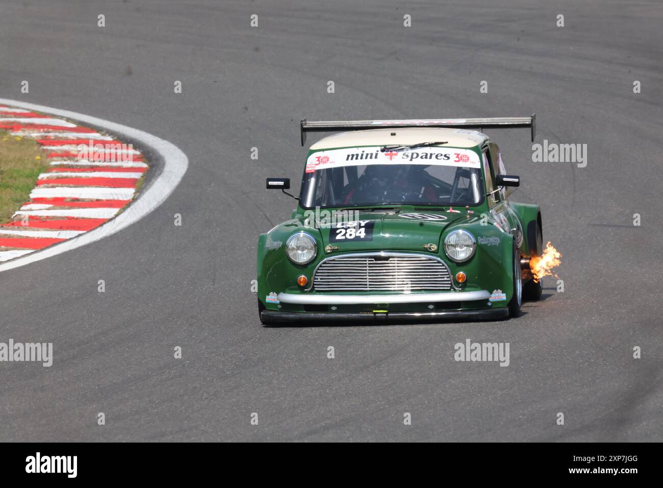 Driver Harvey Death (Green number 60) flare from his car during Track ...