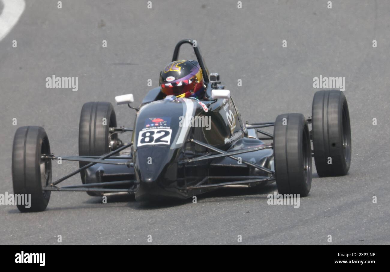 Driver Ben Cox (Black number 82) on track during Track Day at Brands ...