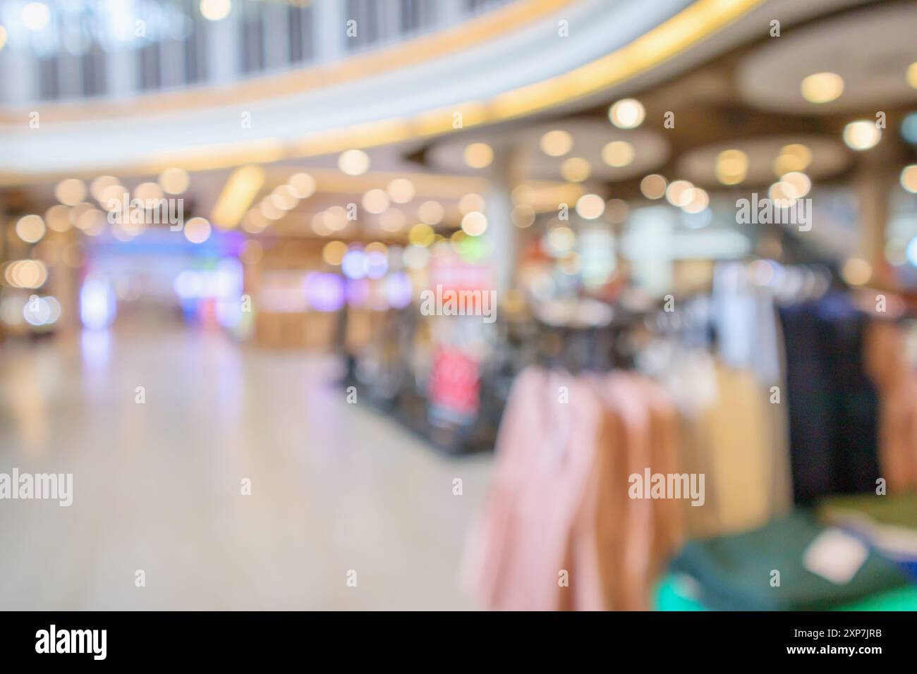 Abstract blur clothing boutique store display interior of shopping mall ...