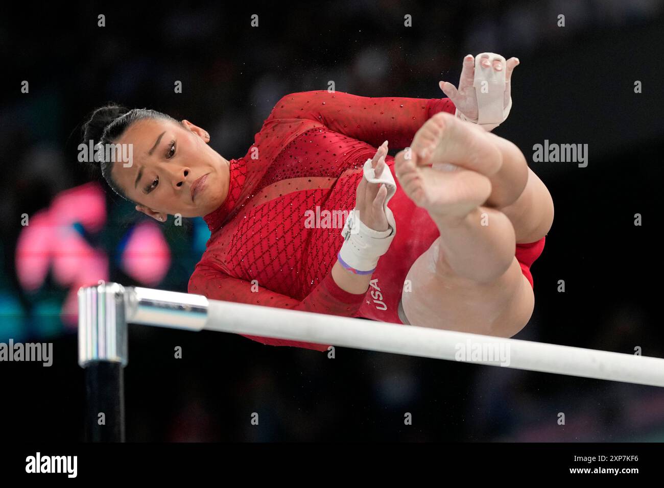 Suni Lee, of the United States, competes during the women's artistic ...