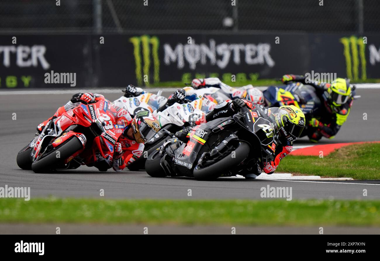 Aprilia Racing's Aleix Espargaro followed by Ducati Lenovo Team's Enea ...