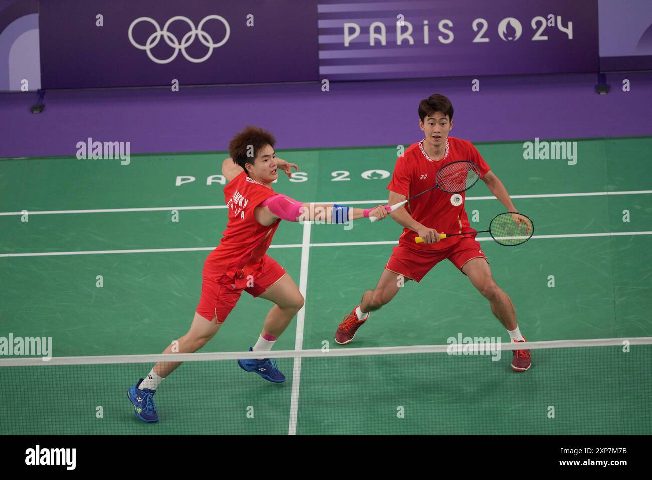 China's Liang Weikeng, left, and Wang Chang play against Taiwan's Lee ...