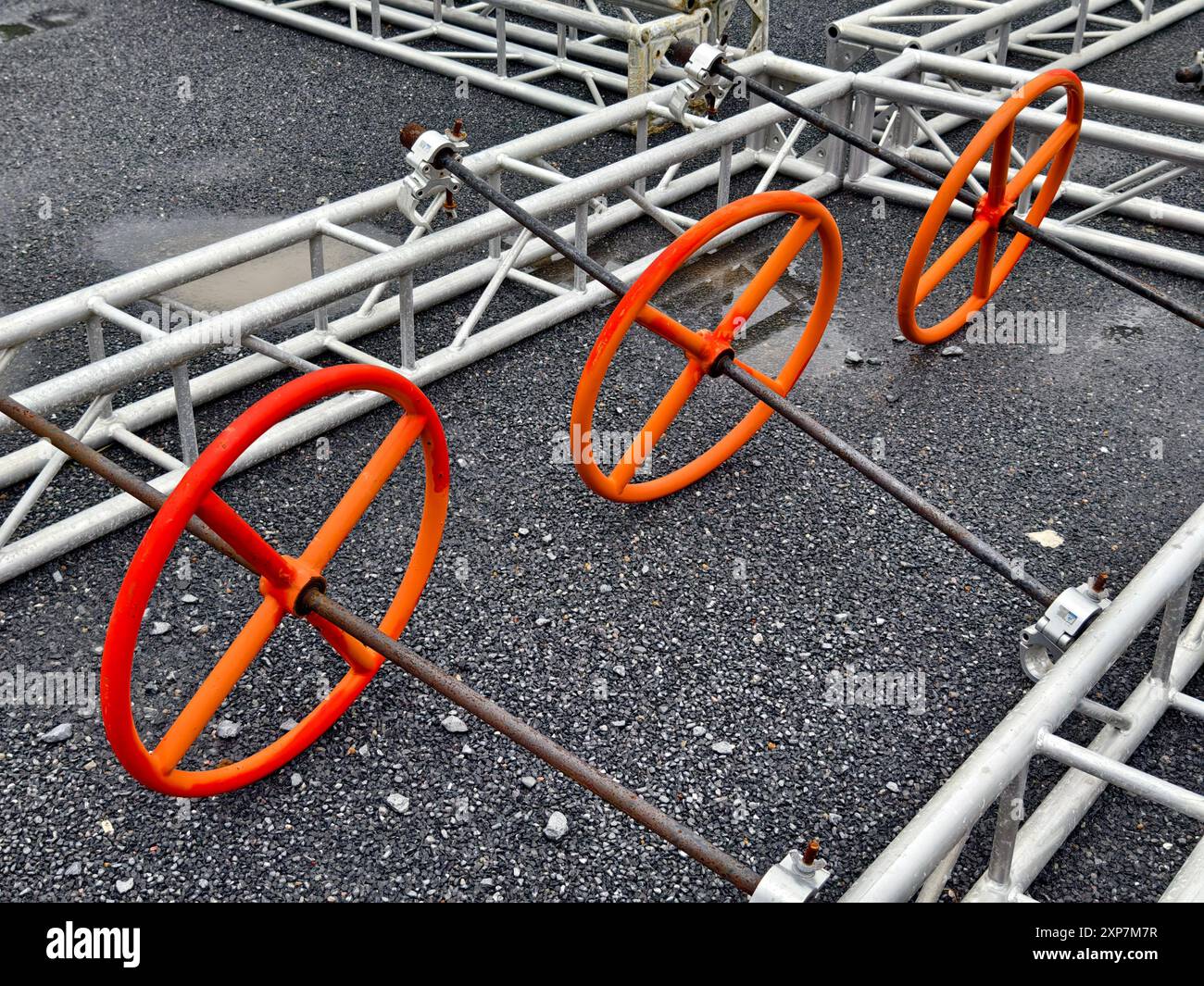 Wheels on a metal structure for stage mounting Stock Photo - Alamy